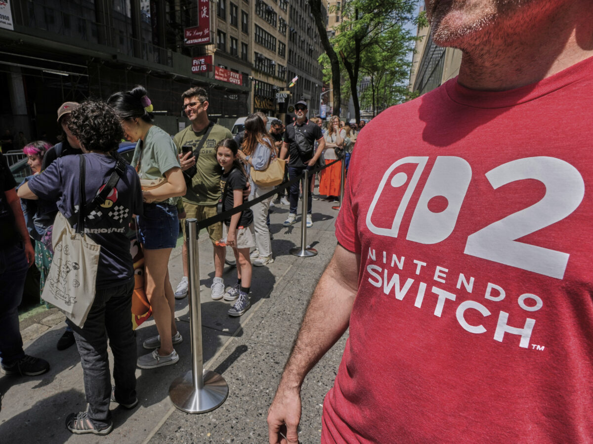 Fans around the world queue up in long lines for the highly anticipated ...